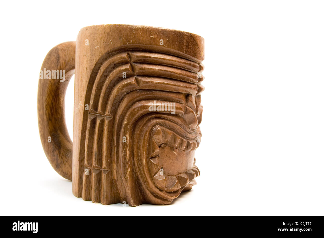 carved wooden tiki mug, isolated on white Stock Photo - Alamy
