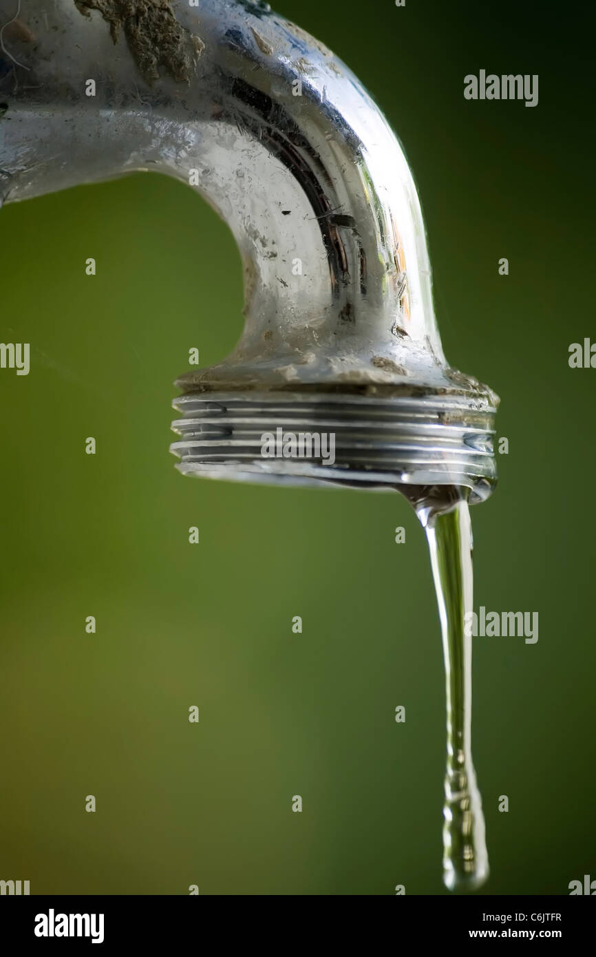 water dripping from a garden tap Stock Photo - Alamy