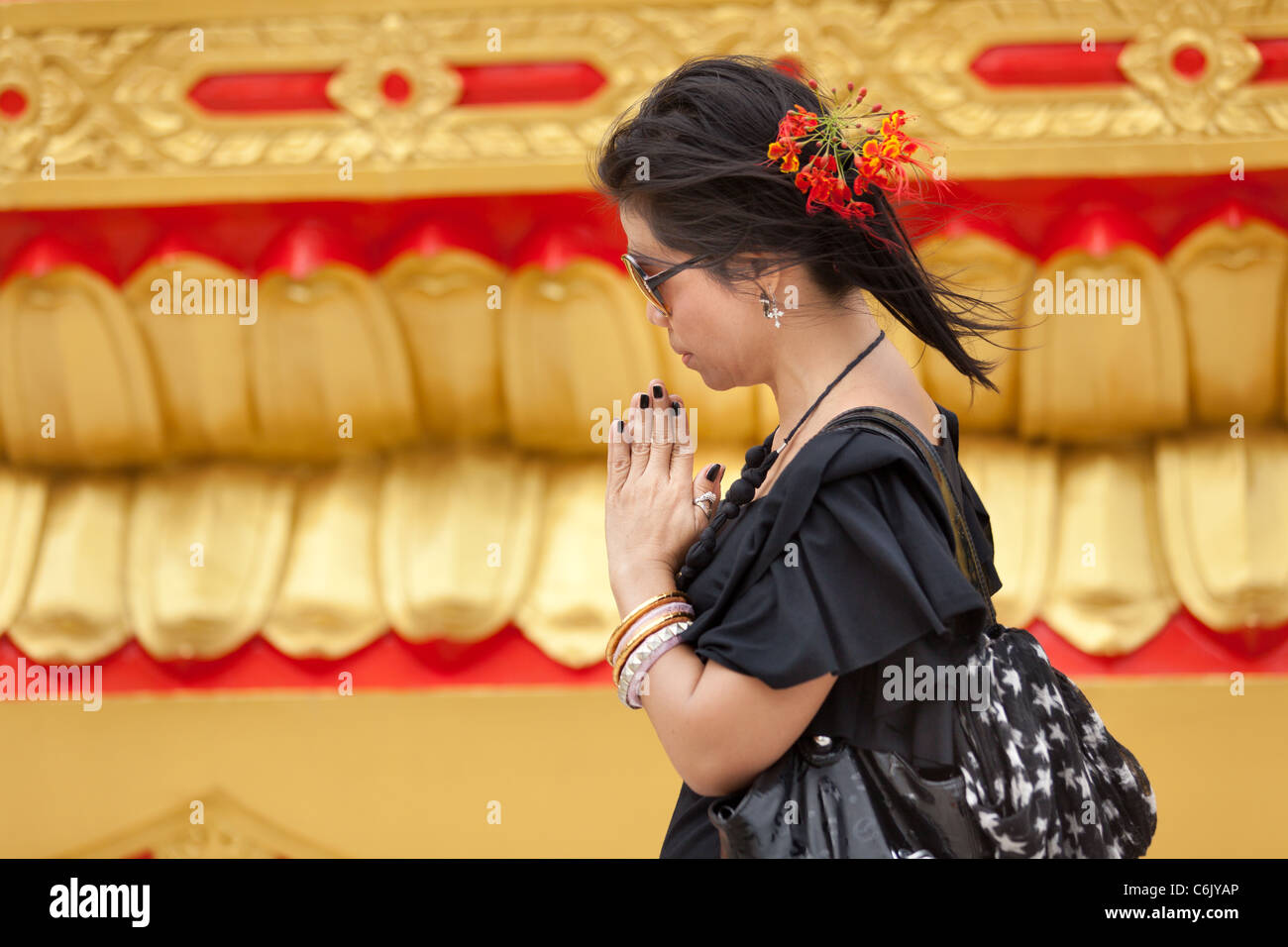 Thai Asian Woman Praying Buddha At Phra Yai Temple Pattaya Thailand