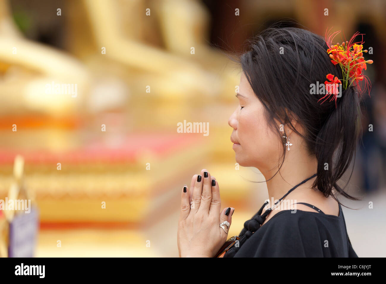 Thai Asian Woman Praying Buddha At Phra Yai Temple Pattaya Thailand