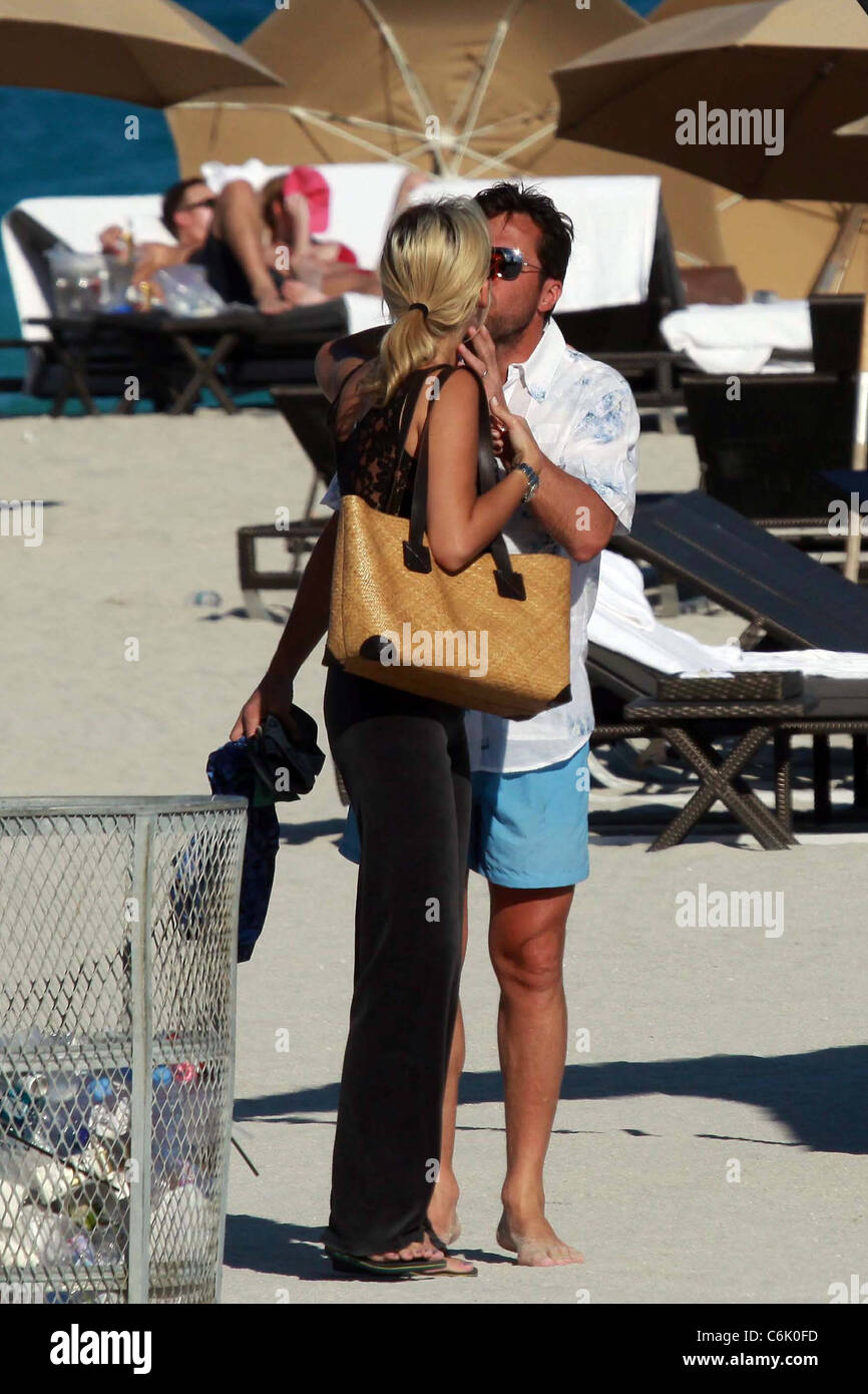 German former football player Lothar MatthÃ¤us shares a kiss with his ...