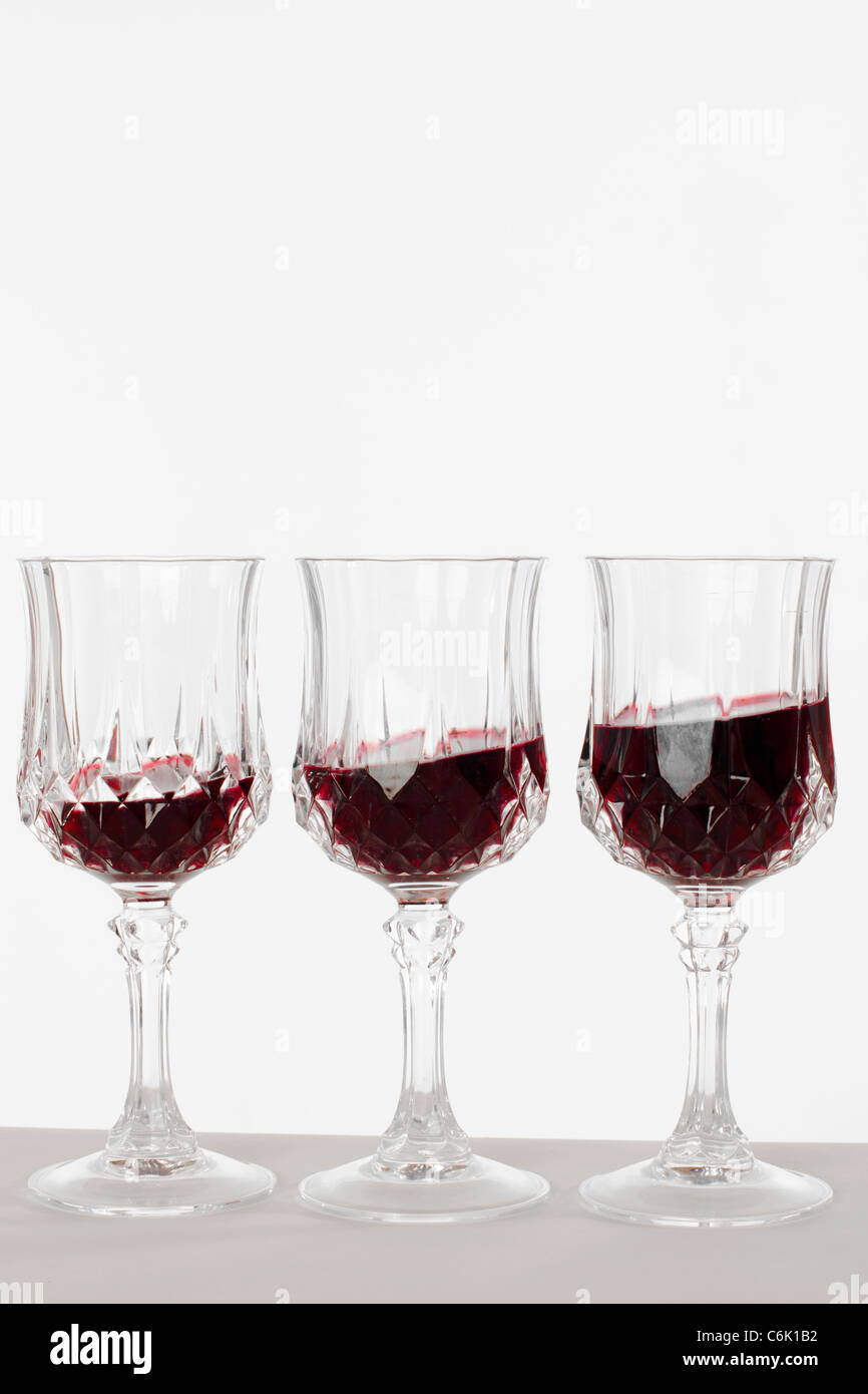 Three glasses of red wine Stock Photo - Alamy