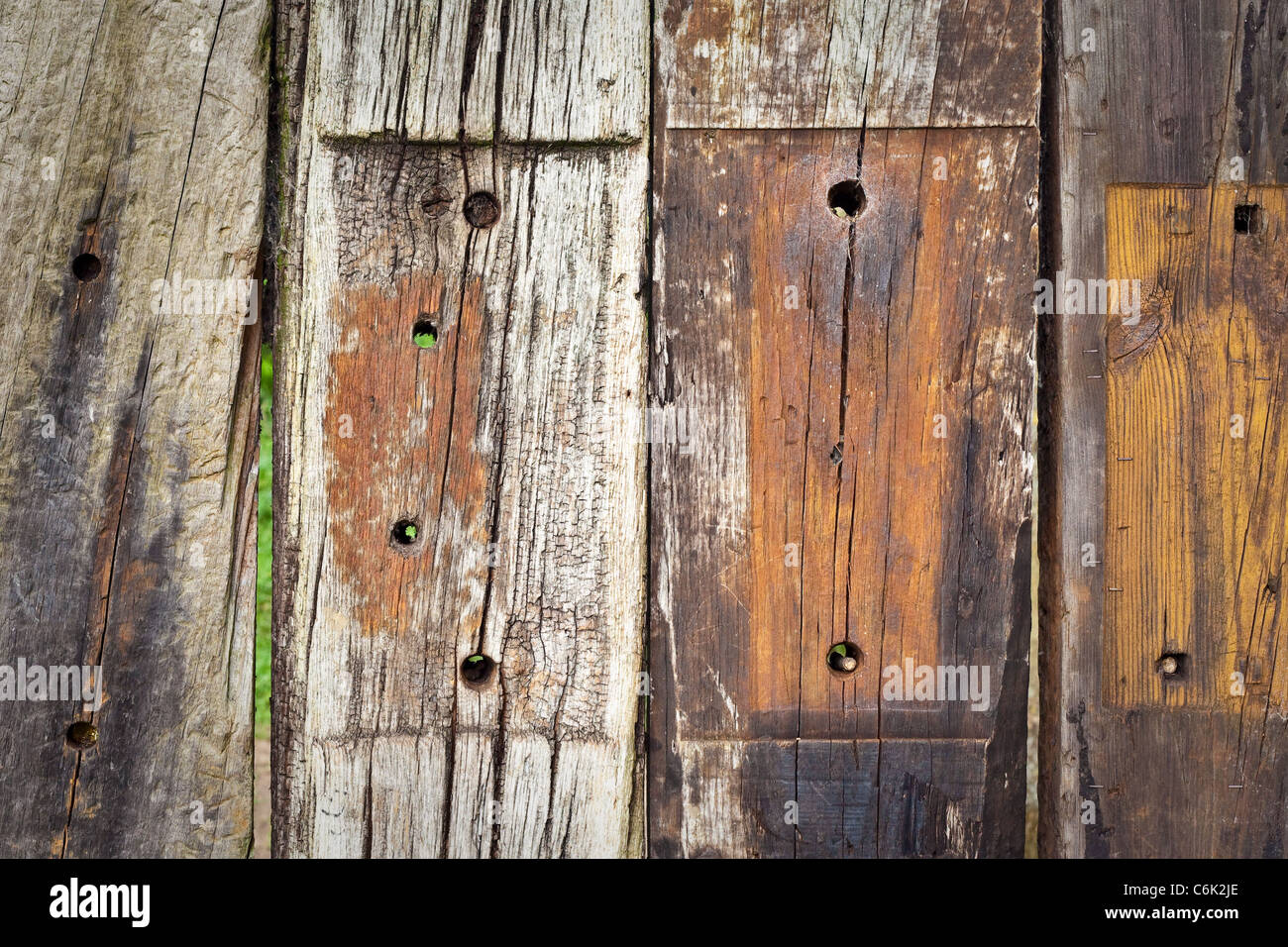 Background of rotting wooden planks with screw holes Stock Photo - Alamy