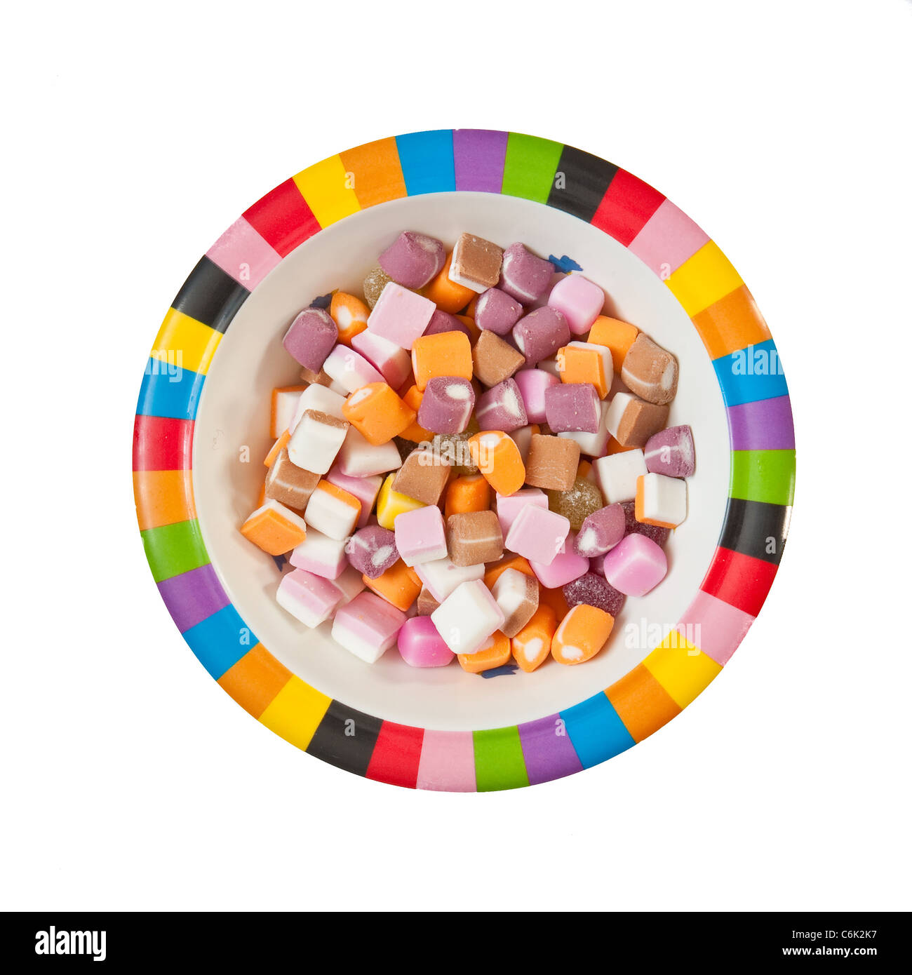 Nice bowl of dolly mixture candy isolated on white Stock Photo - Alamy