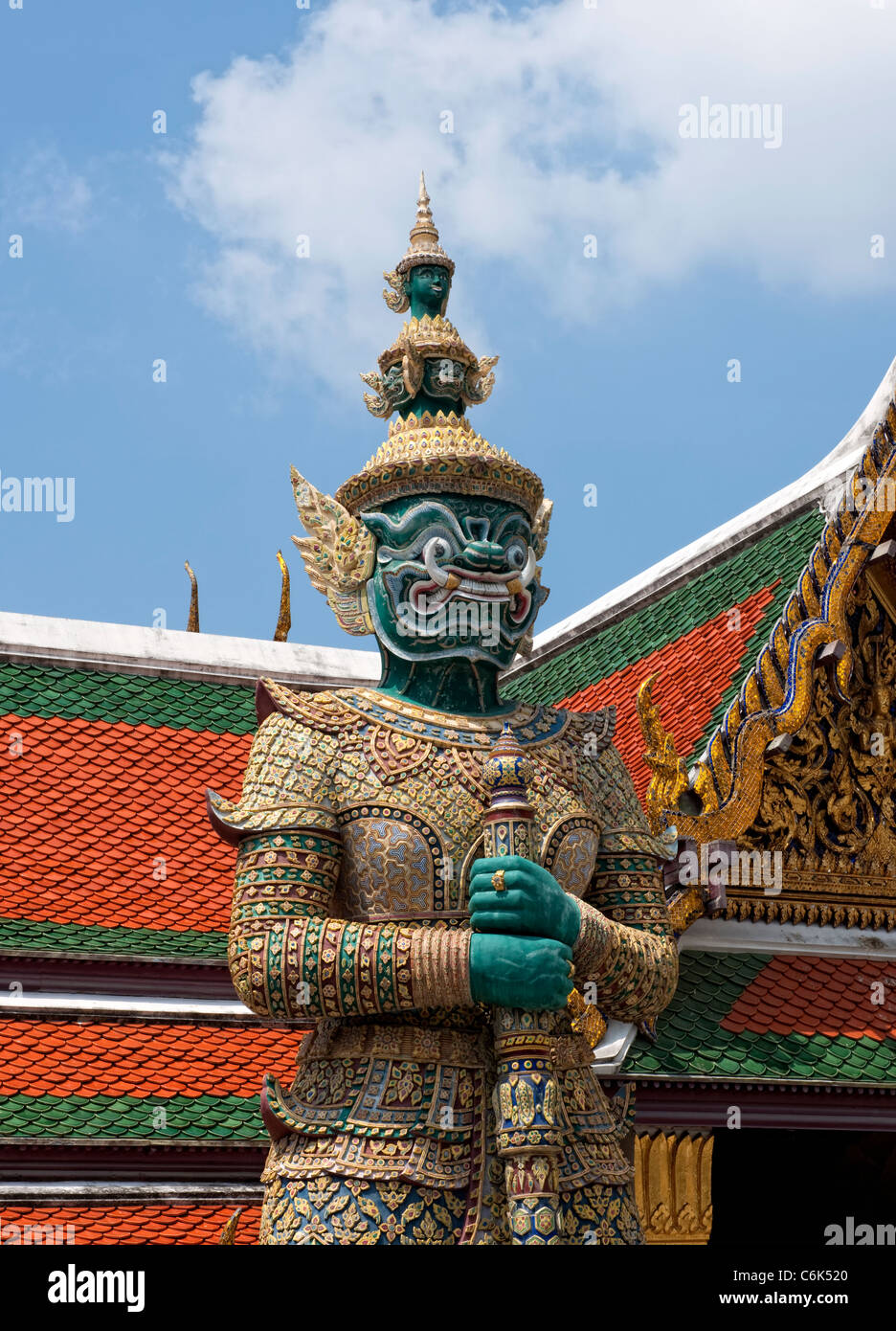Ornate temple building and statue in the grounds of the Grand Palace ...