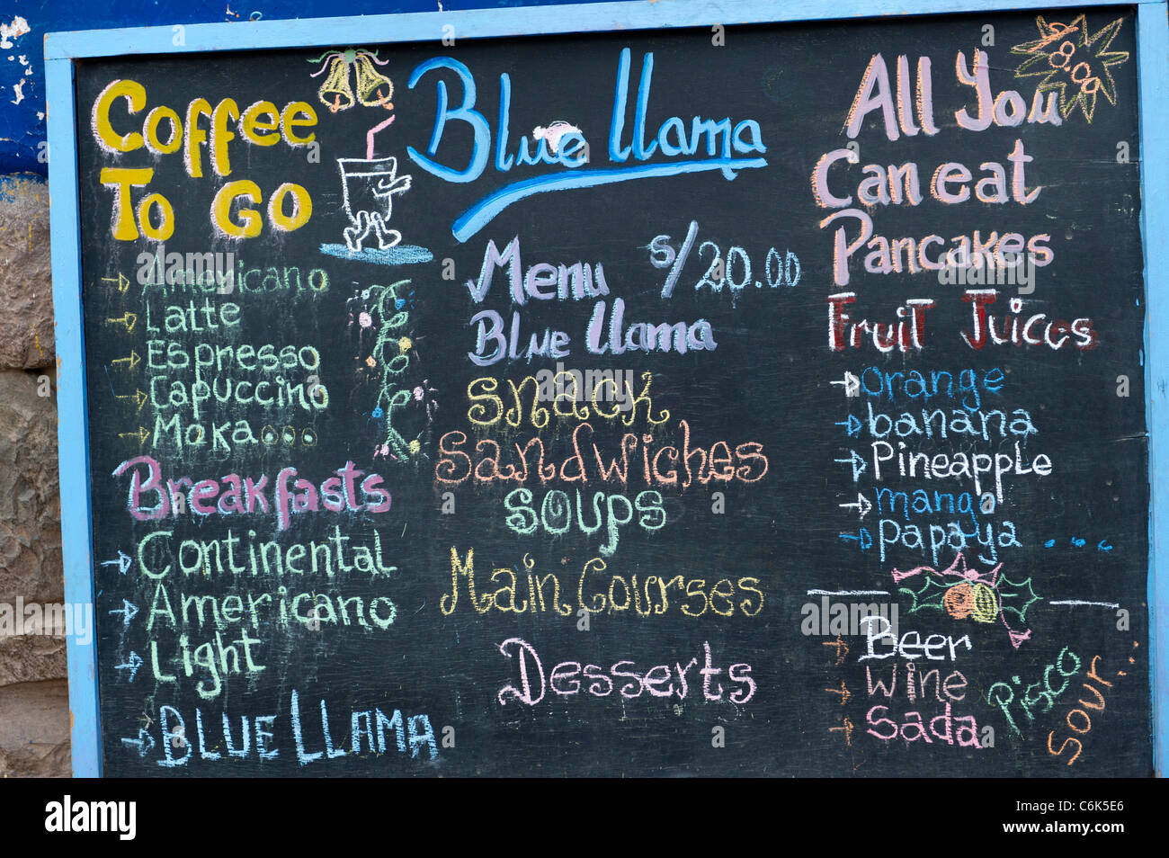 Menu board at a restaurant, Pisac, Sacred Valley, Cusco Region, Peru ...