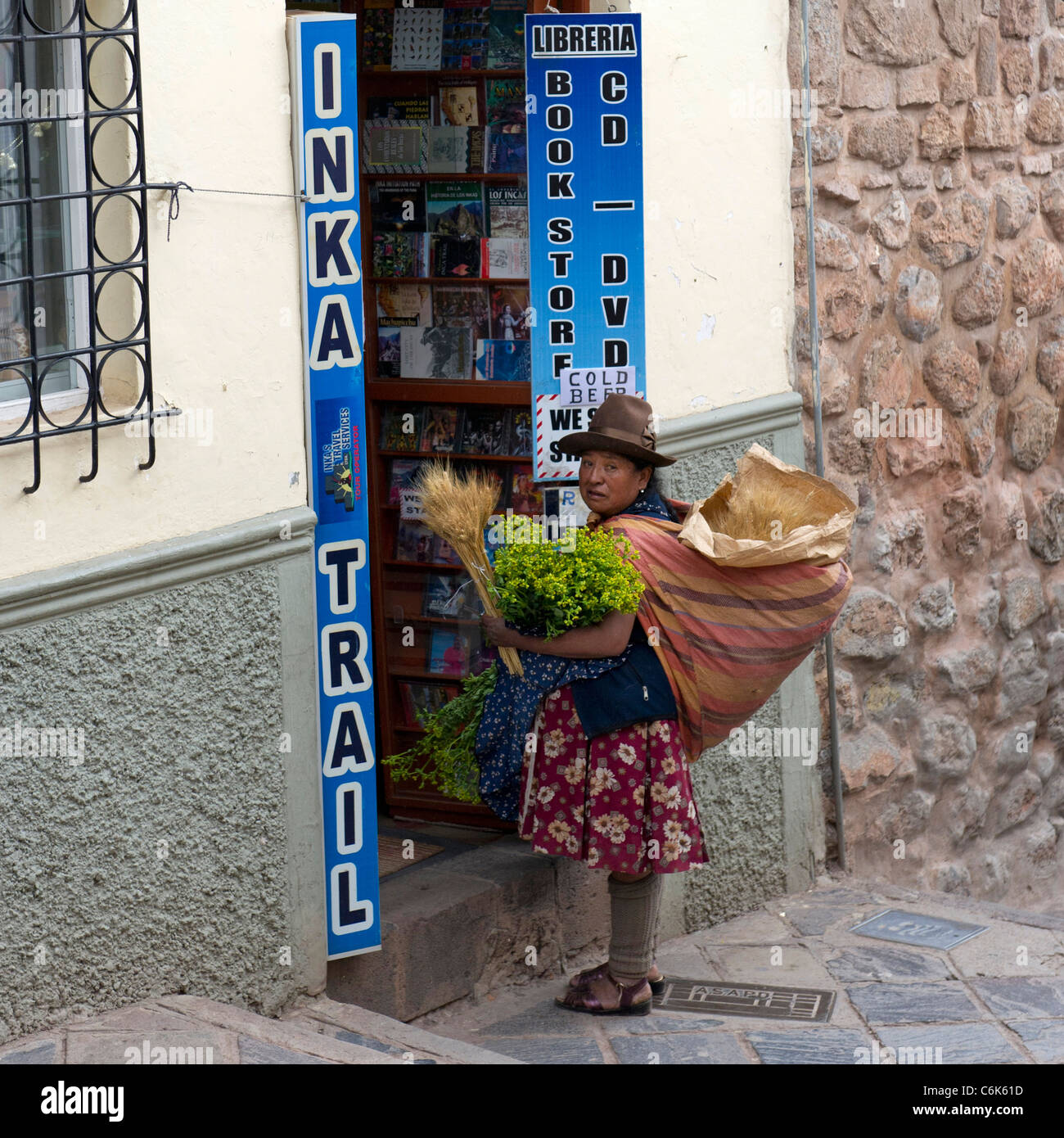 Peruvian woman selling plants at a store hi-res stock photography and ...