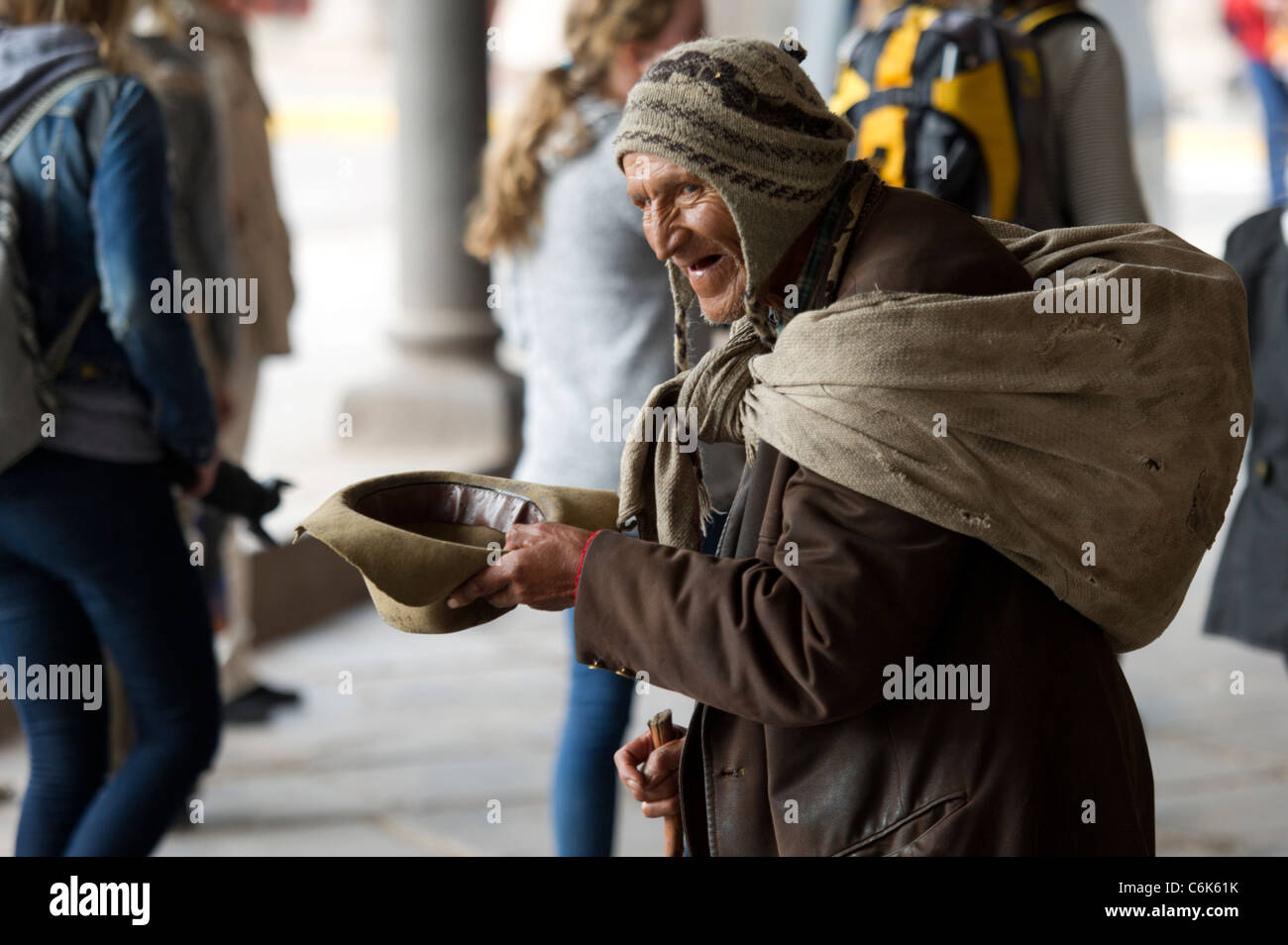 Homeless man begging for money, Cuzco, Peru Stock Photo - Alamy