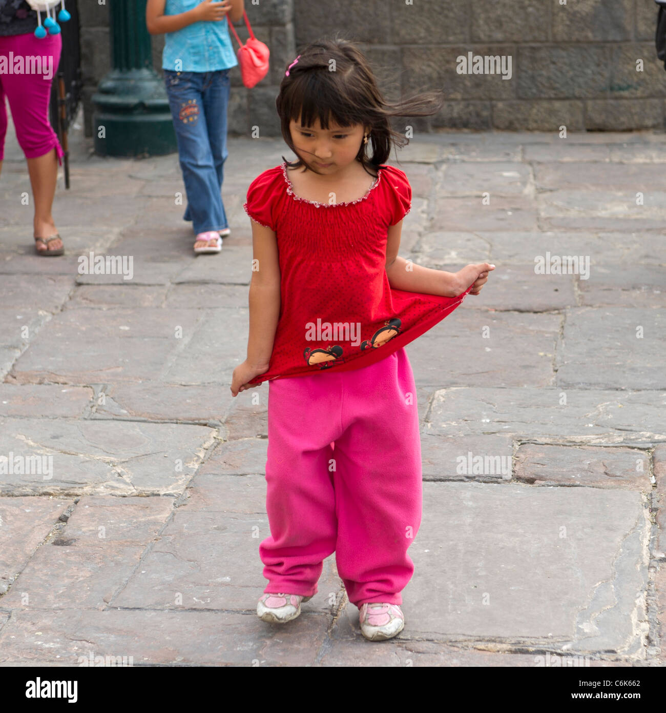 Close up of a girl pulling her top hi-res stock photography and images ...