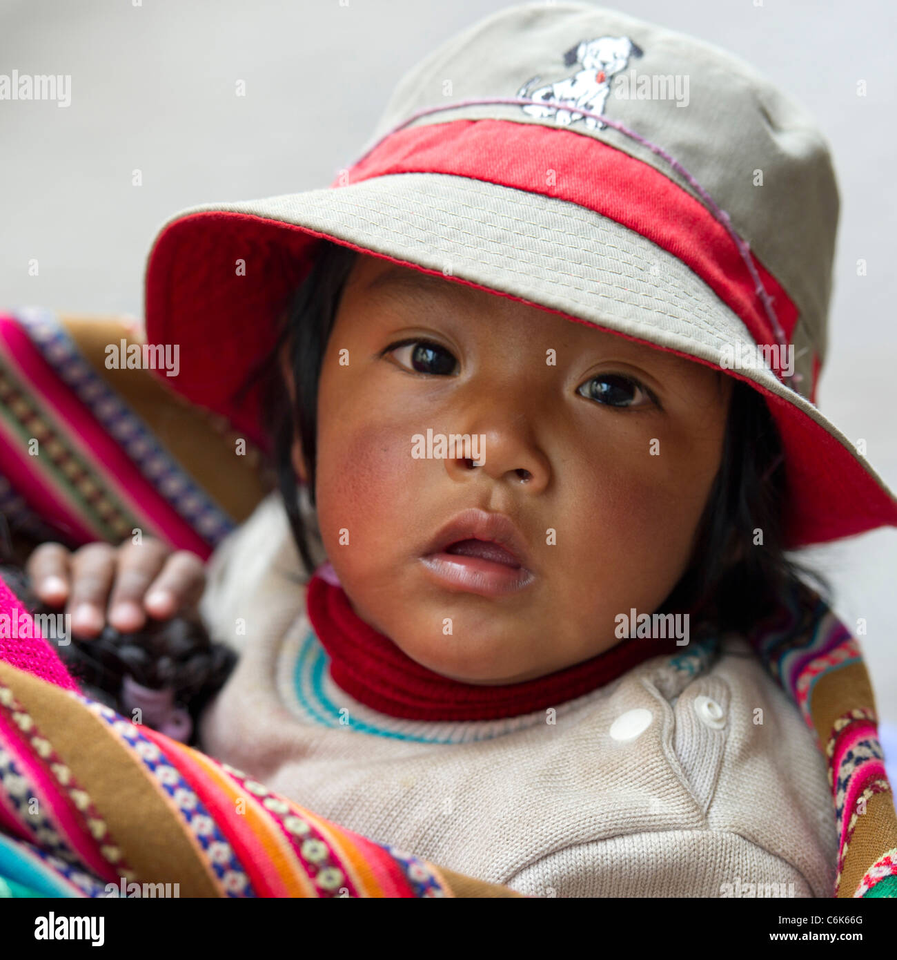Portrait of a baby wearing a hat, Sacred Valley, Cusco Region, Peru ...