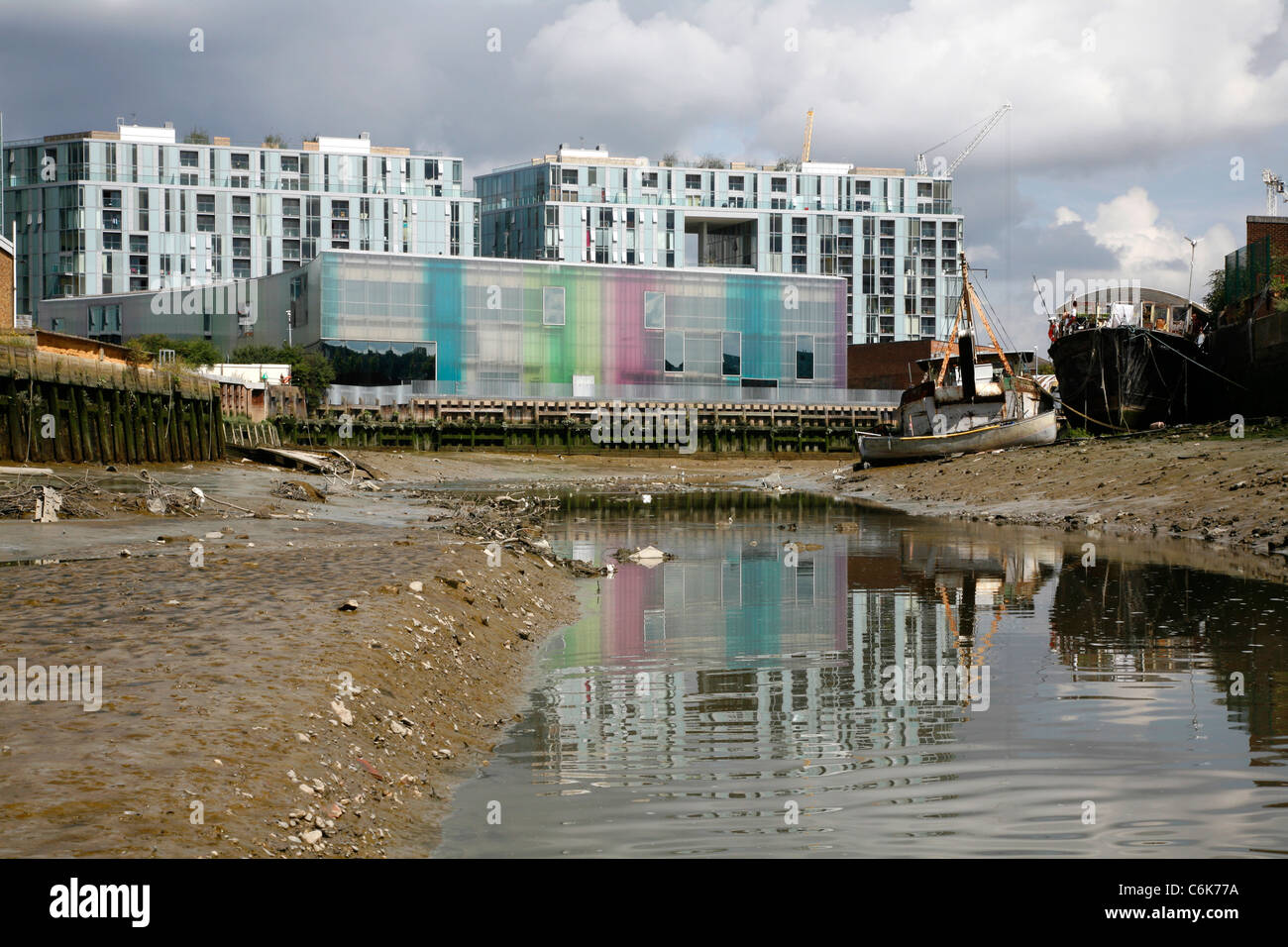Looking along Deptford Creek at low tide to the Trinity Laban ...