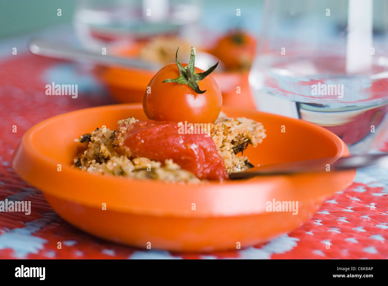 Tomato and herb crumble Stock Photo - Alamy