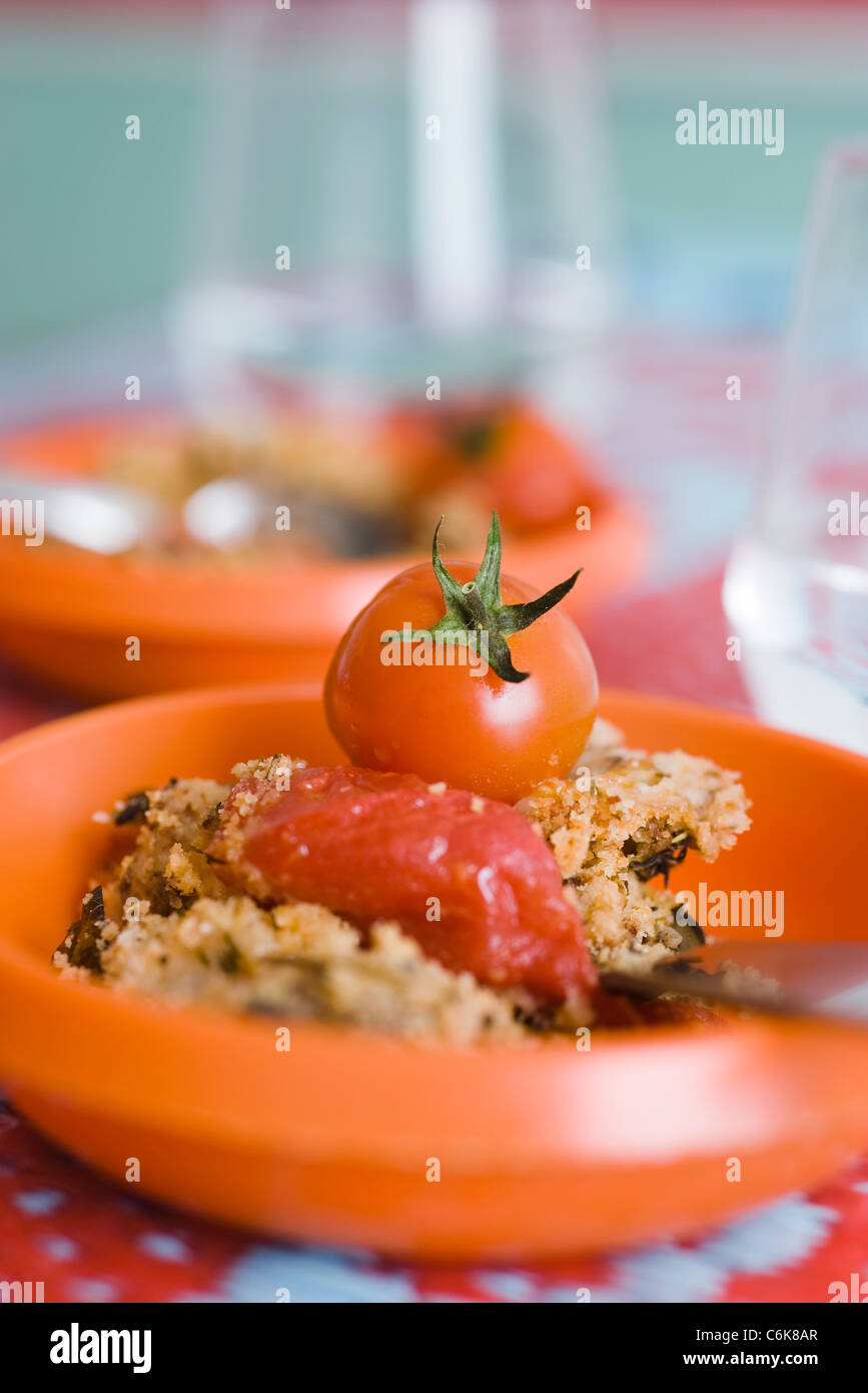 Tomato and herb crumble Stock Photo - Alamy