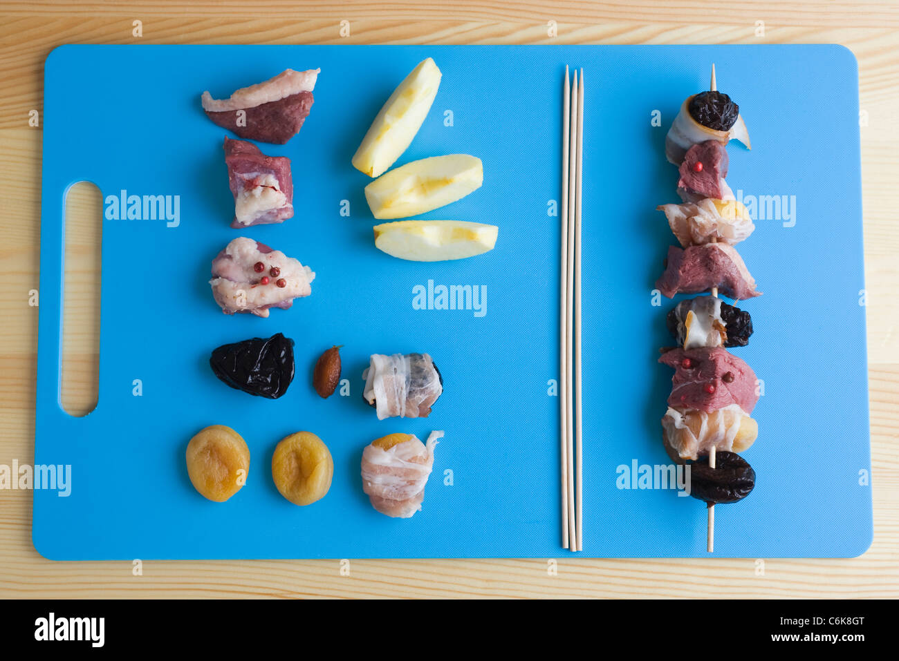 Duck and fruit skewers Stock Photo - Alamy