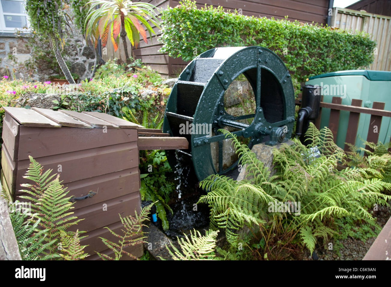 Iron water wheel Wayside Museum Zennor Cornwall UK Stock Photo - Alamy