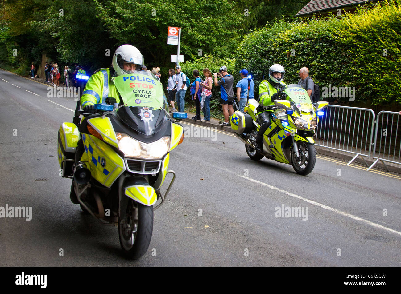 Race support police outriders at the foot of Box Hill, London Surrey ...