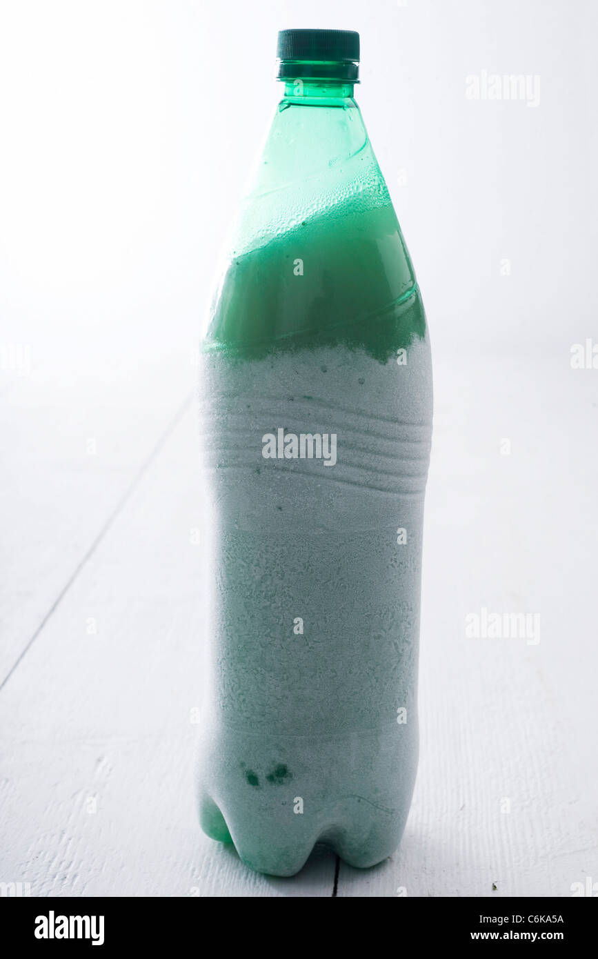 Fish stock frozen in bottle Stock Photo - Alamy