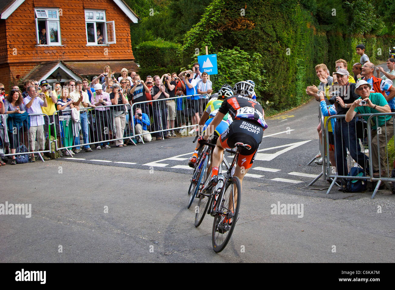 Cyclists racing at the foot of Box Hill, London Surrey cycle classic ...
