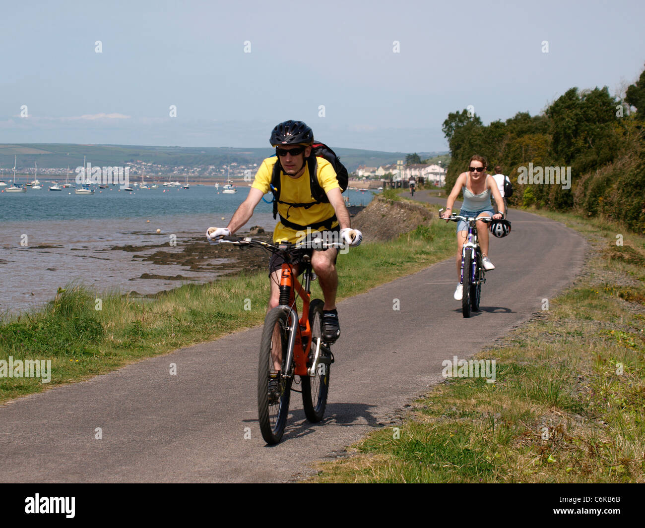 Riders on the cycle path, Instow, North Devon, UK Stock Photo - Alamy