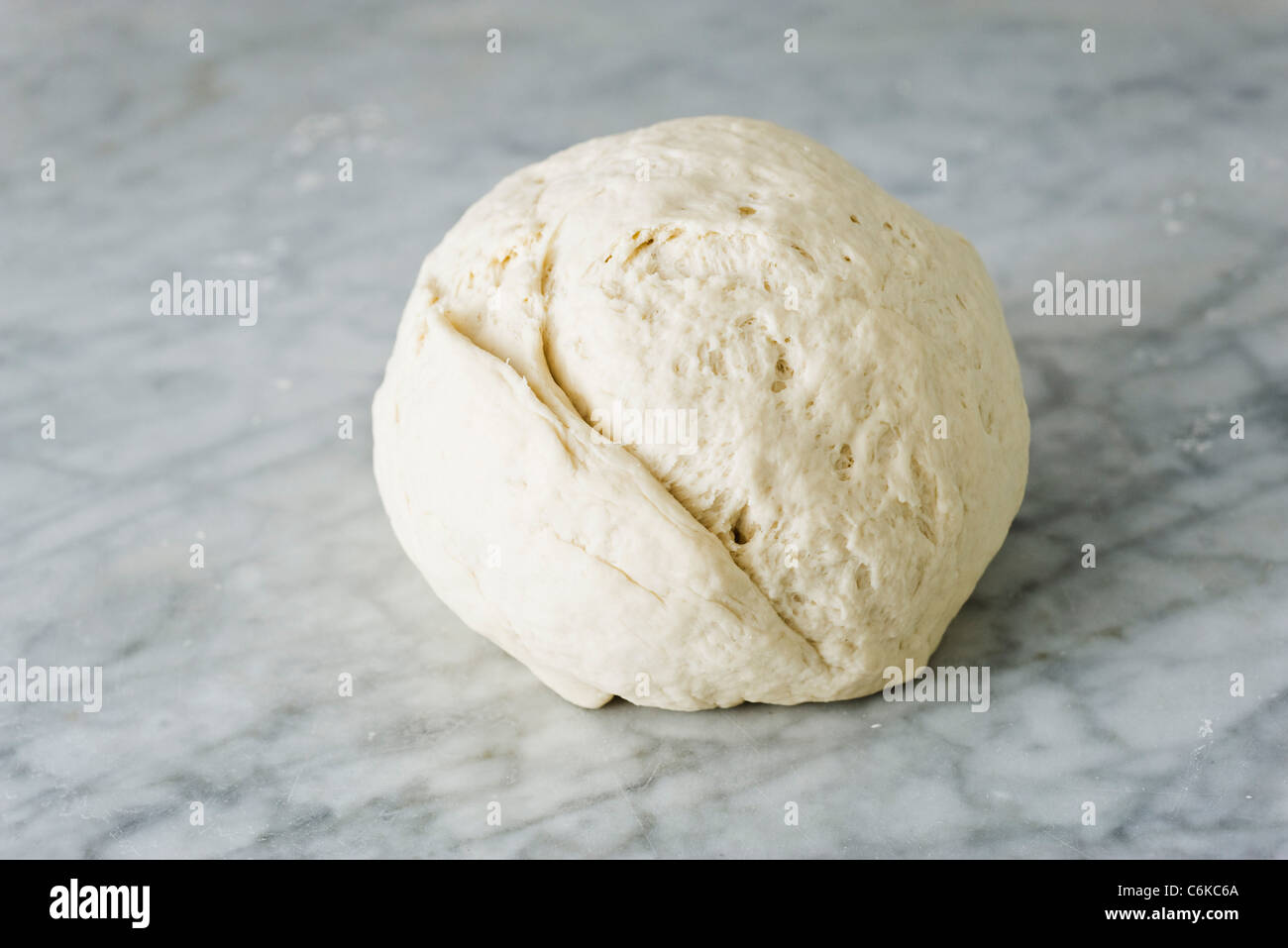 Basic bread dough formed into ball Stock Photo - Alamy
