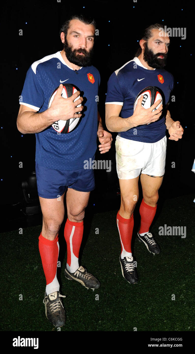 French rugby union player Sebastien Chabal poses next to his wax ...
