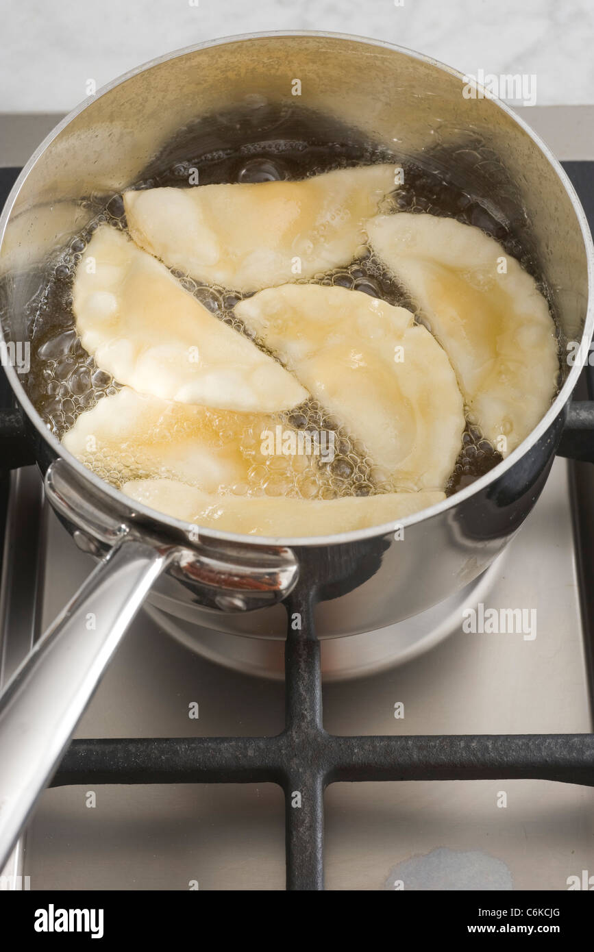 Fried ricotta ravioli with honey Stock Photo - Alamy