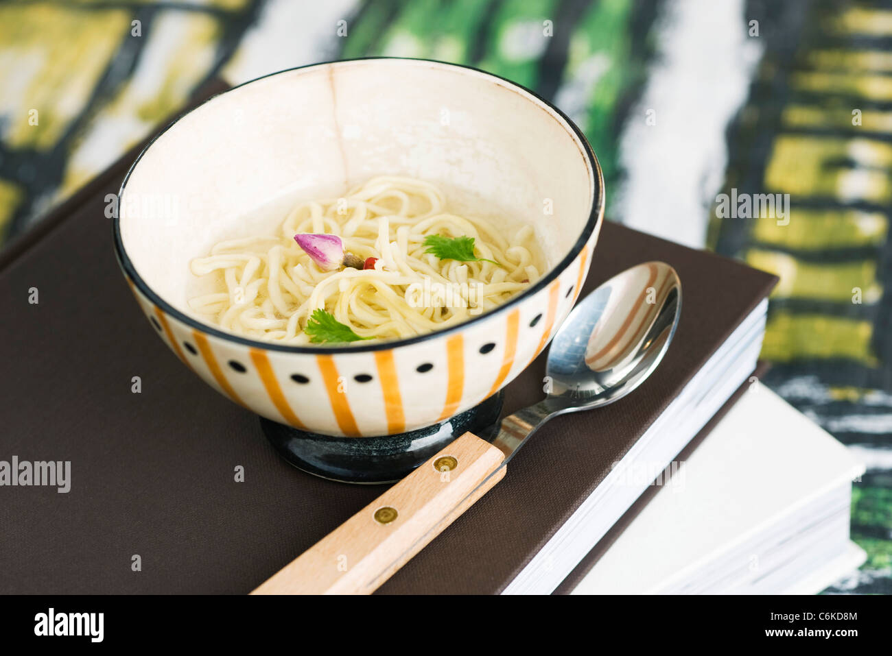 Chicken and rose soup with spaghettini Stock Photo - Alamy