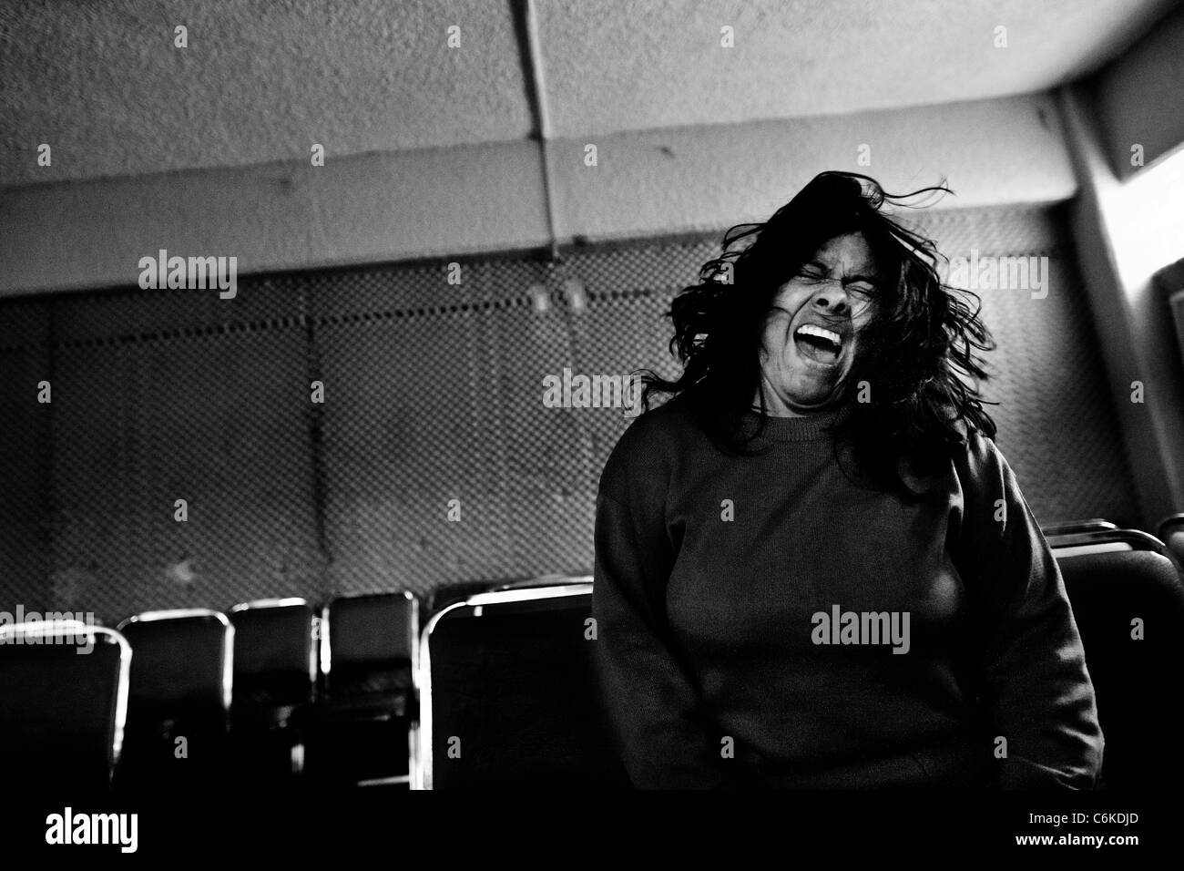 A Mexican woman yells desperately during the exorcism rite performed at ...
