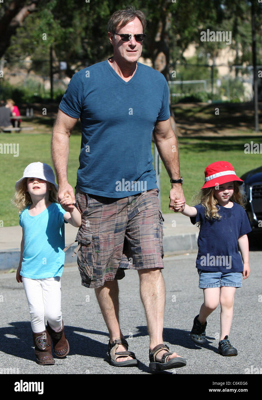 Tom Mahoney spends the day with his daughters Eden and Savannah at a ...