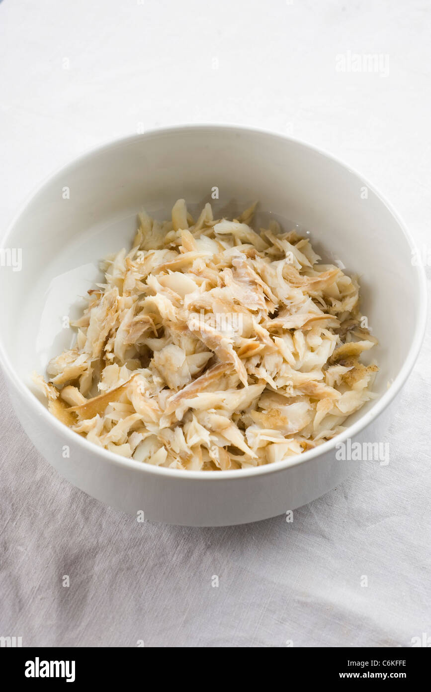 Shredded cod in bowl Stock Photo - Alamy