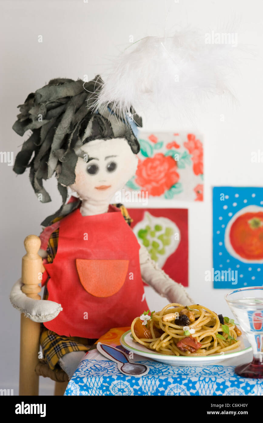 Spaghetti with nuts and raisins Stock Photo - Alamy