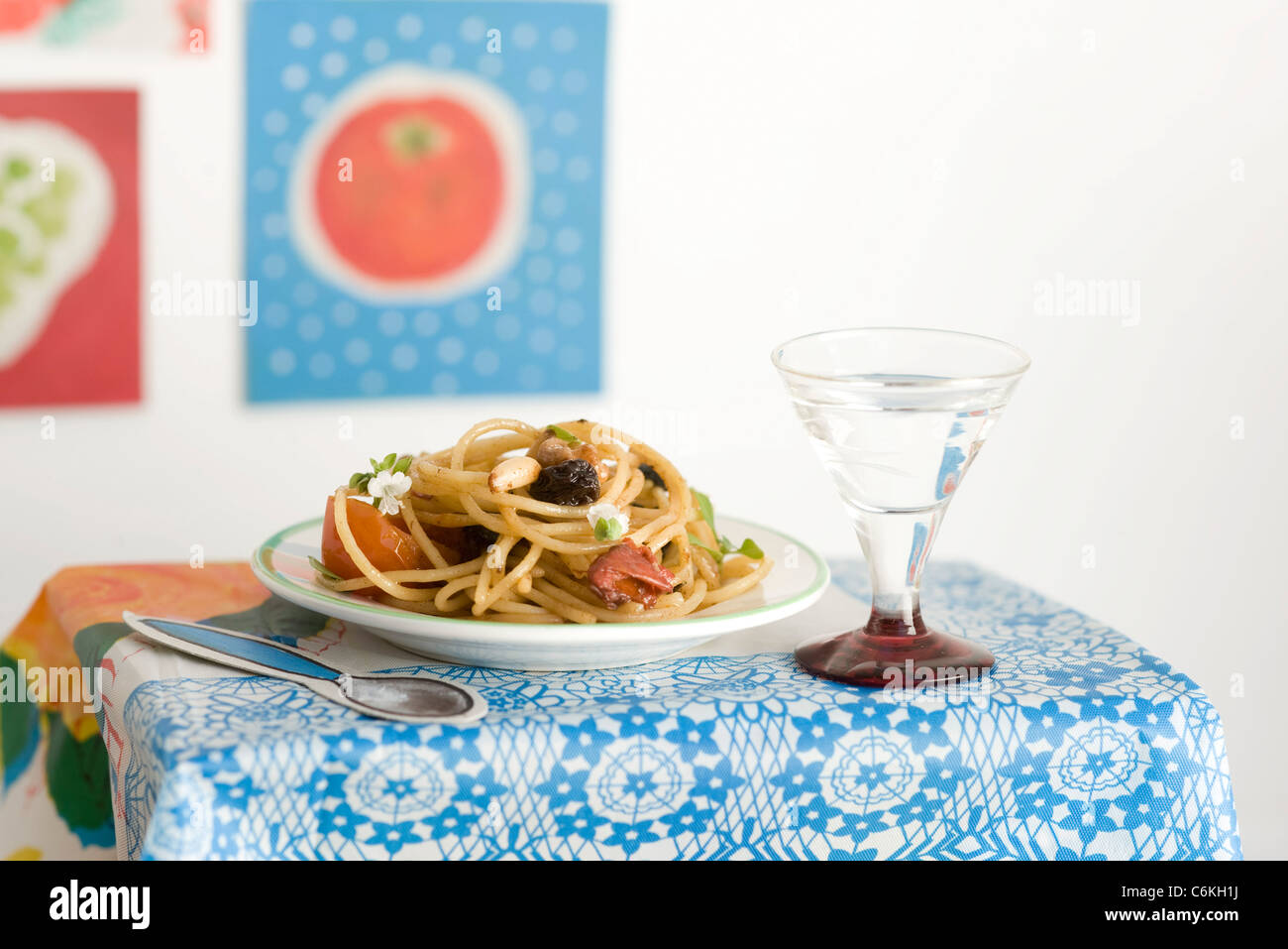 Spaghetti with nuts and raisins Stock Photo - Alamy