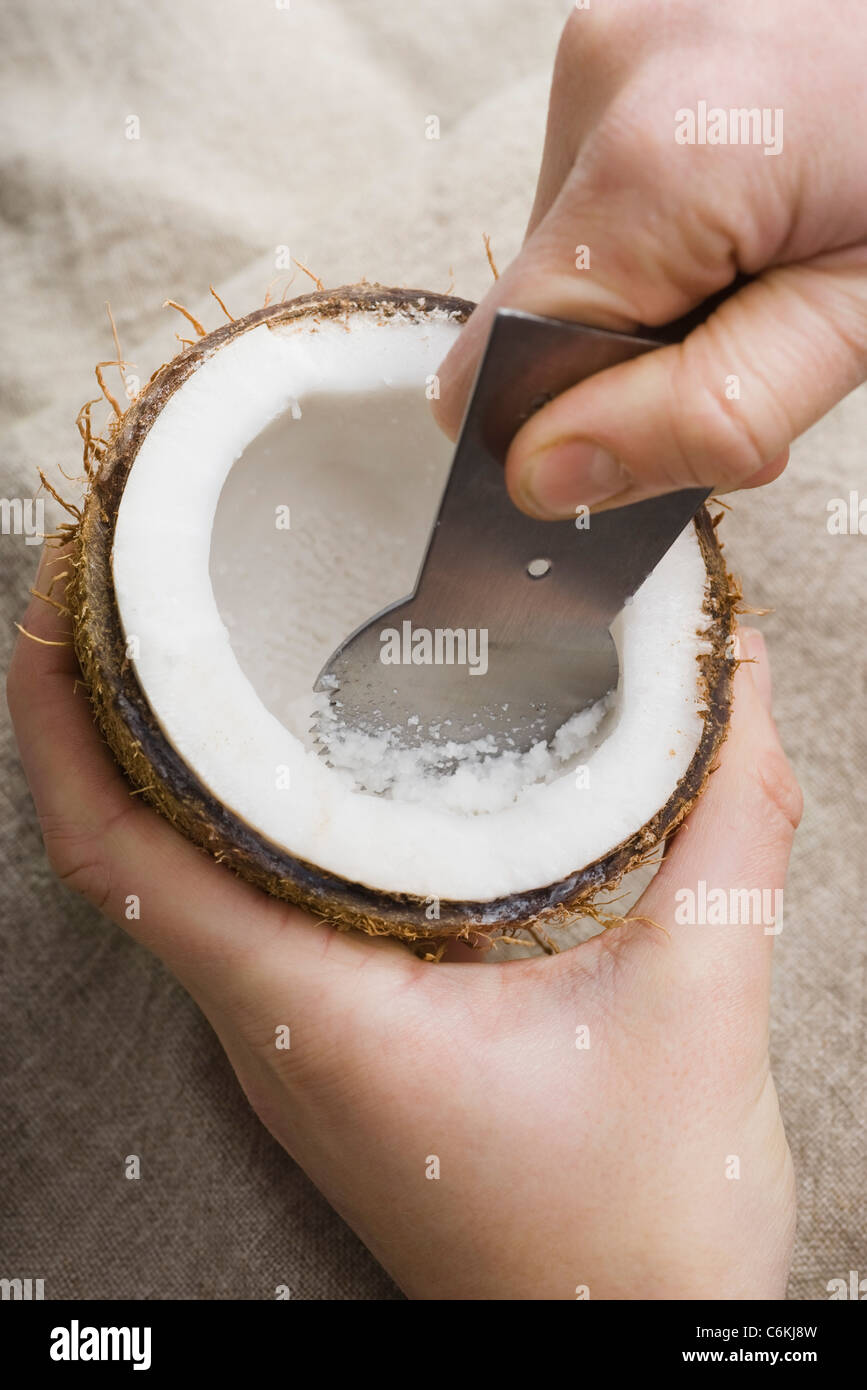 Grating coconut hi-res stock photography and images - Alamy