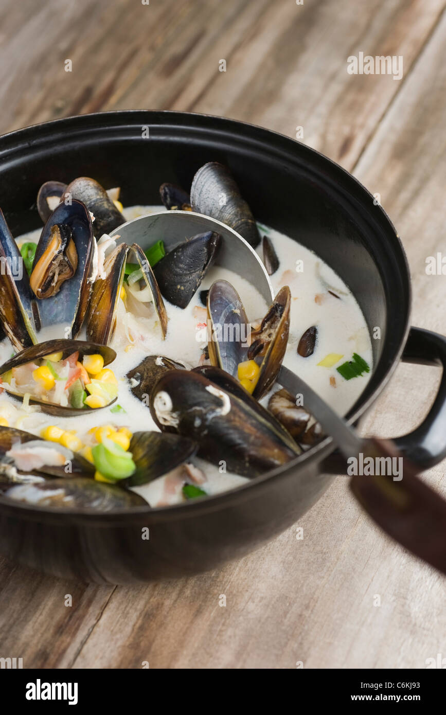 Sweetcorn and mussel chowder Stock Photo - Alamy
