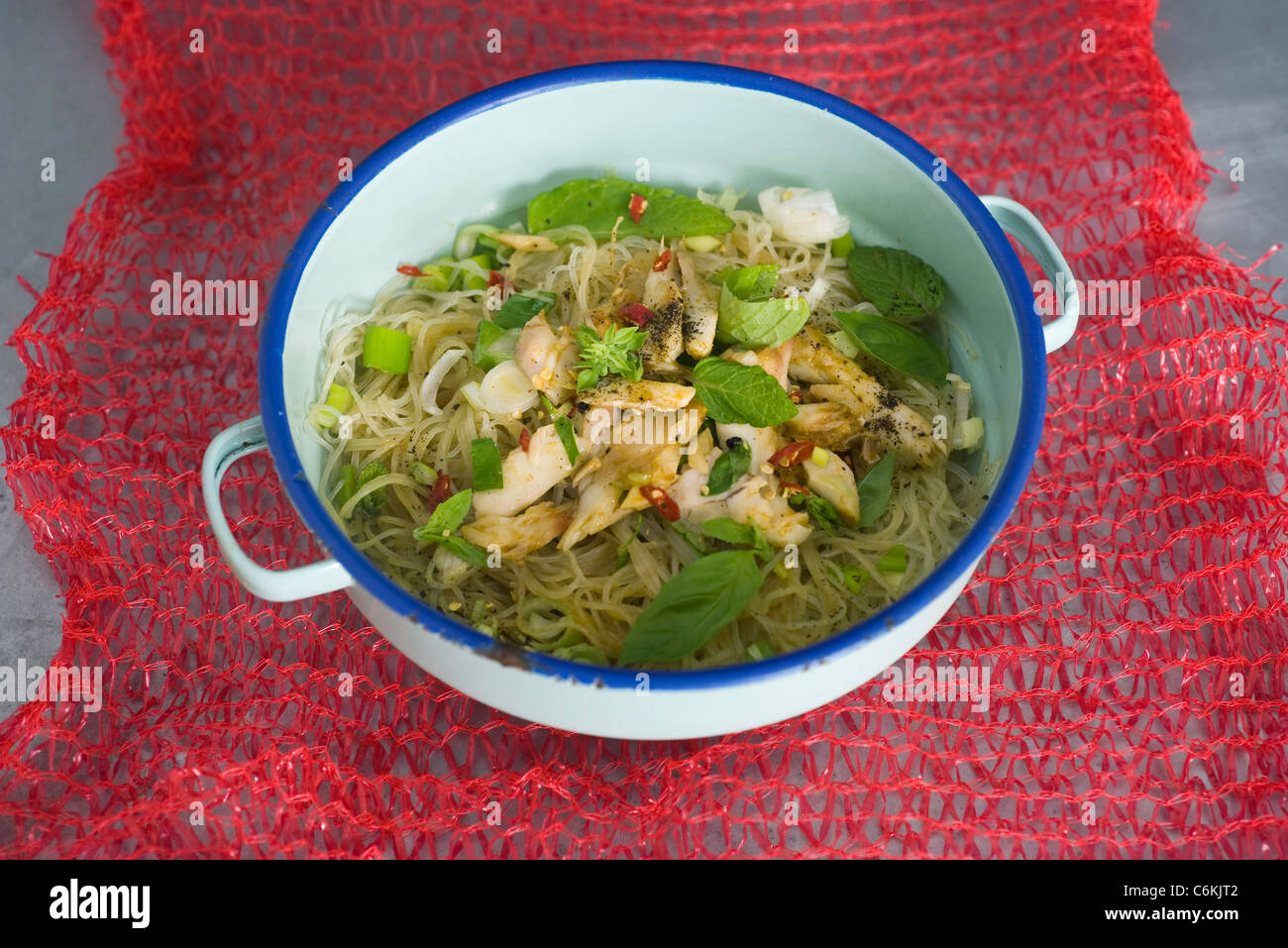 Spicy fish salad Stock Photo - Alamy