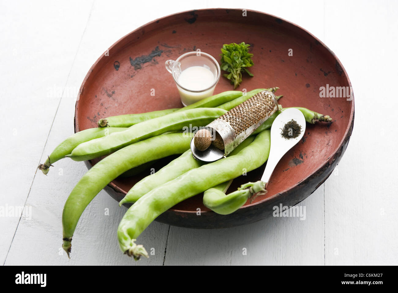 Broad beans with poppy seeds Stock Photo - Alamy