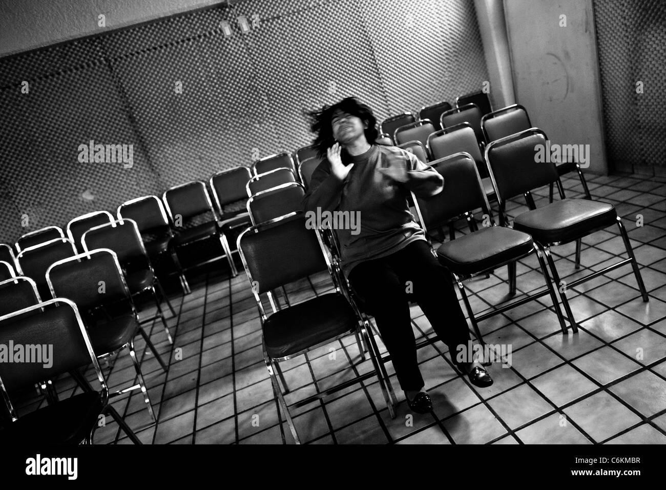 A Mexican woman fights with demons during the exorcism ritual performed ...