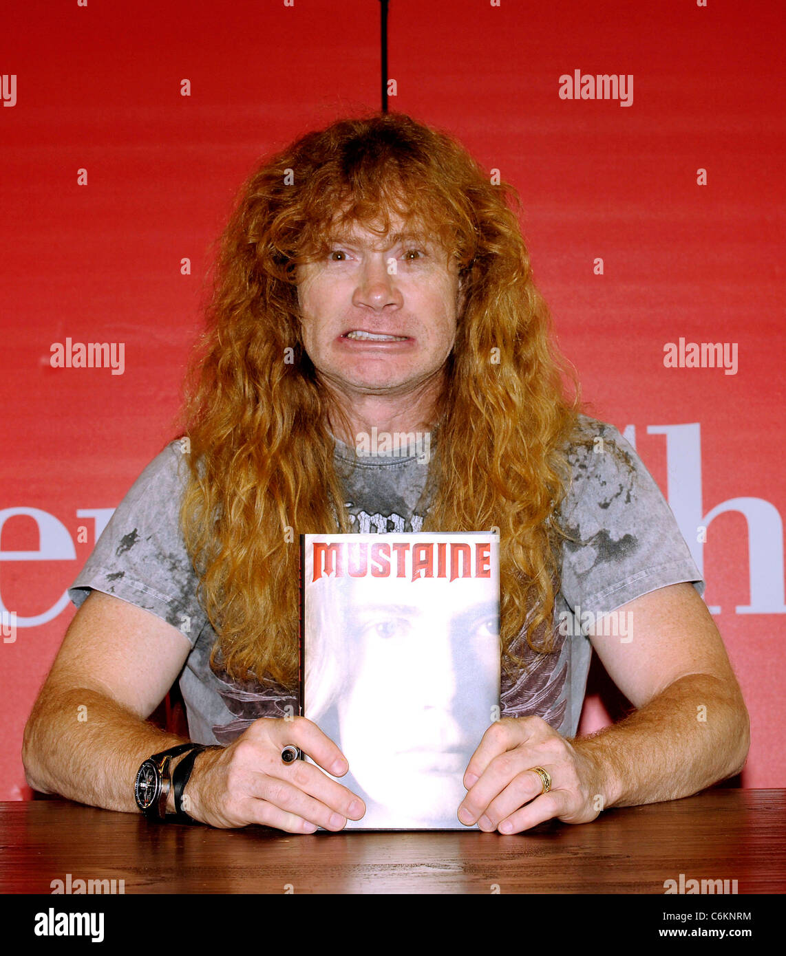Dave Mustaine of Megadeth signs copies of his new book Mustaine: A ...