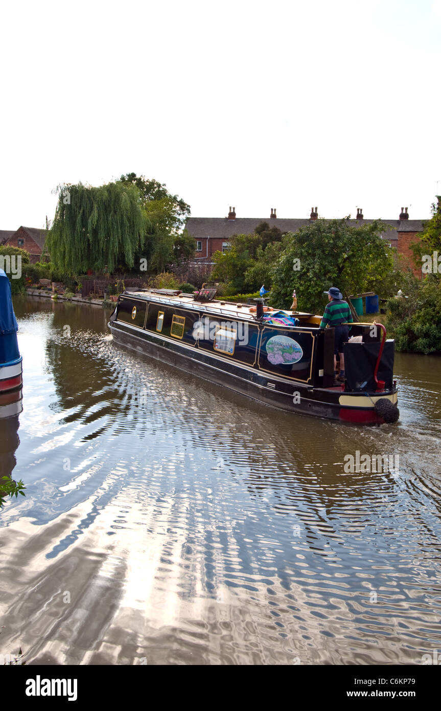 Narrowboat on the Trent and Mersey Canal approaching Shardlow Lock In ...