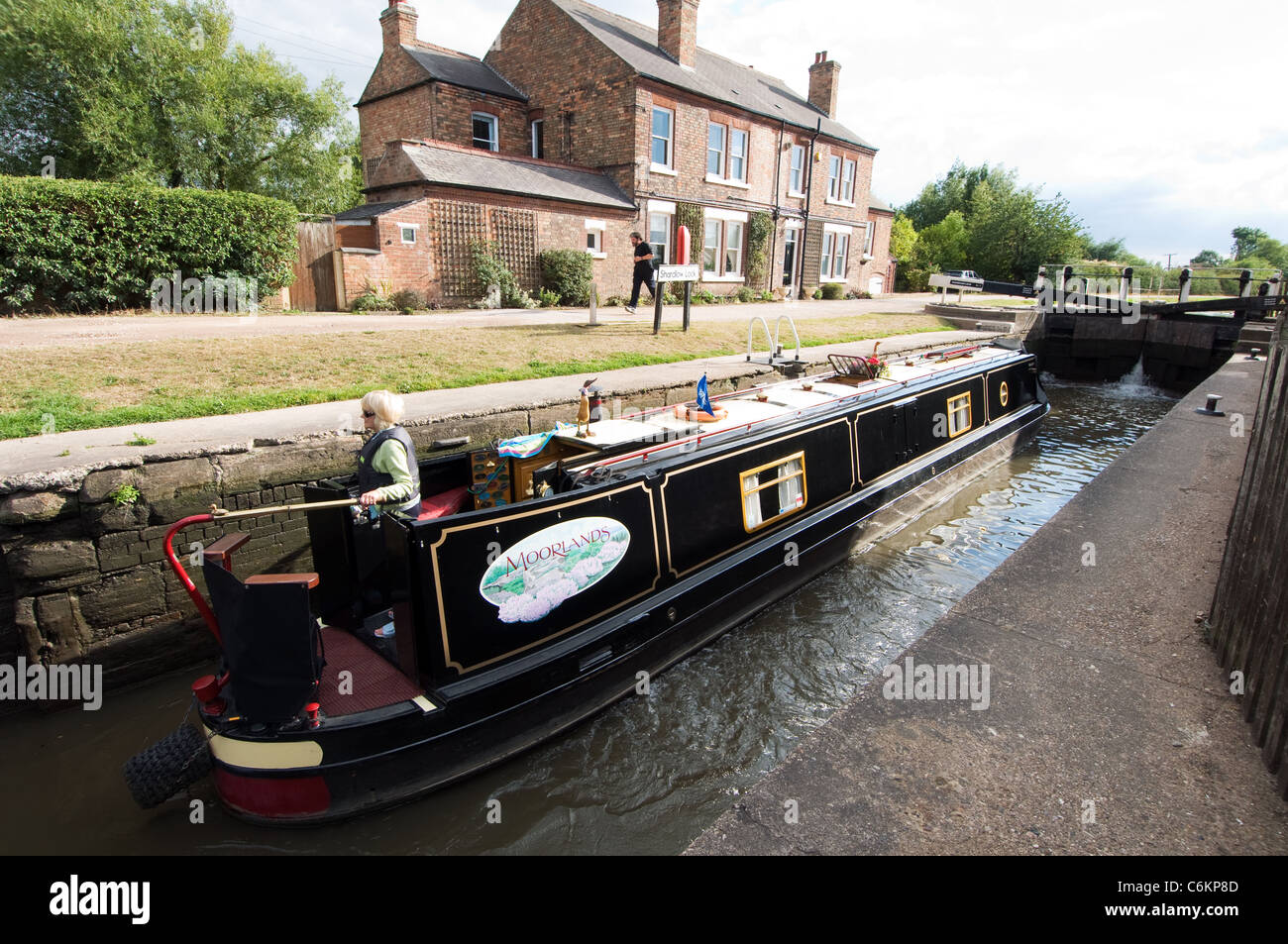 Narrowboat passing through Shardlow Lock in Derbyshire Stock Photo - Alamy