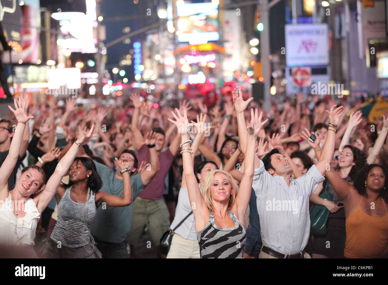 The cast of 'Friends With Benefits' filming in Times Square New York ...