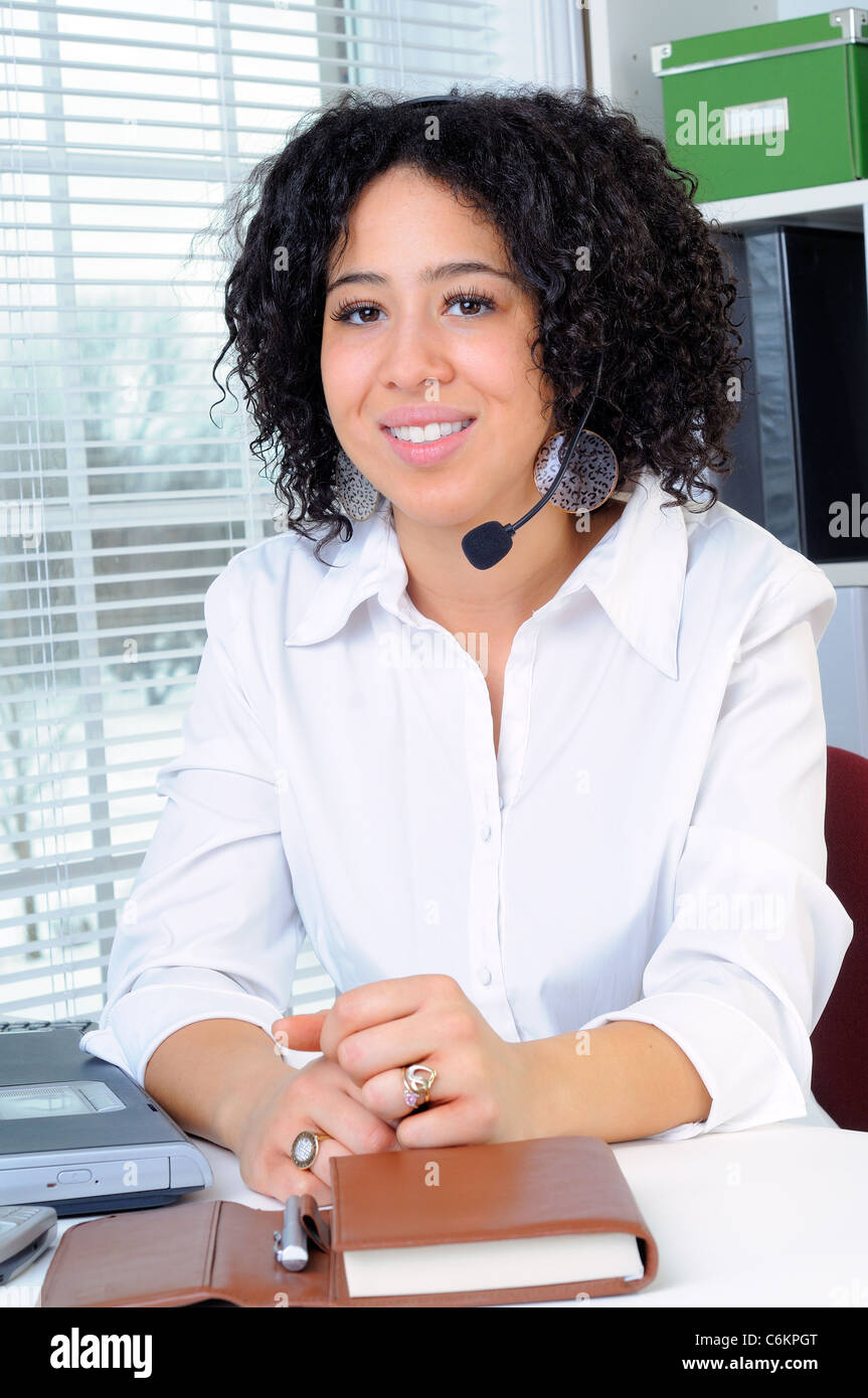 Beautiful African American Female Call Center Agent Wearing A Telephone ...