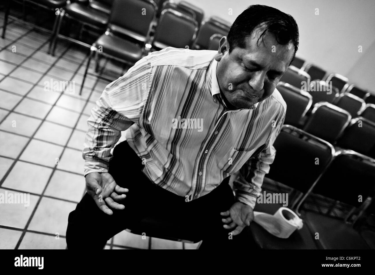 A Mexican man struggles during the exorcism ritual performed at the ...