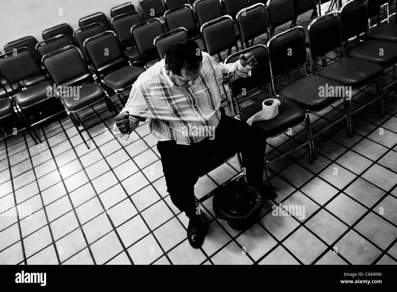 A Mexican man struggles during the exorcism ritual performed at the ...