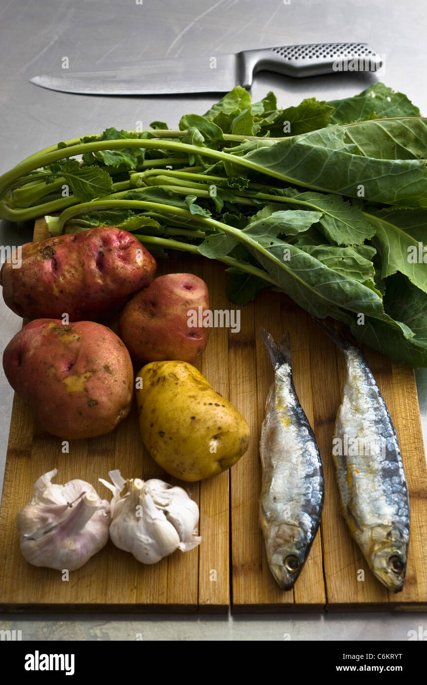 Sardines on chopping board hi-res stock photography and images - Alamy