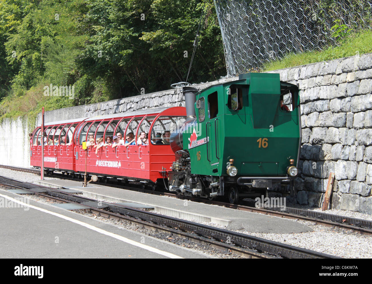 Steam locomotive arriving at Brienz with a train on the Brienz Rothorn ...