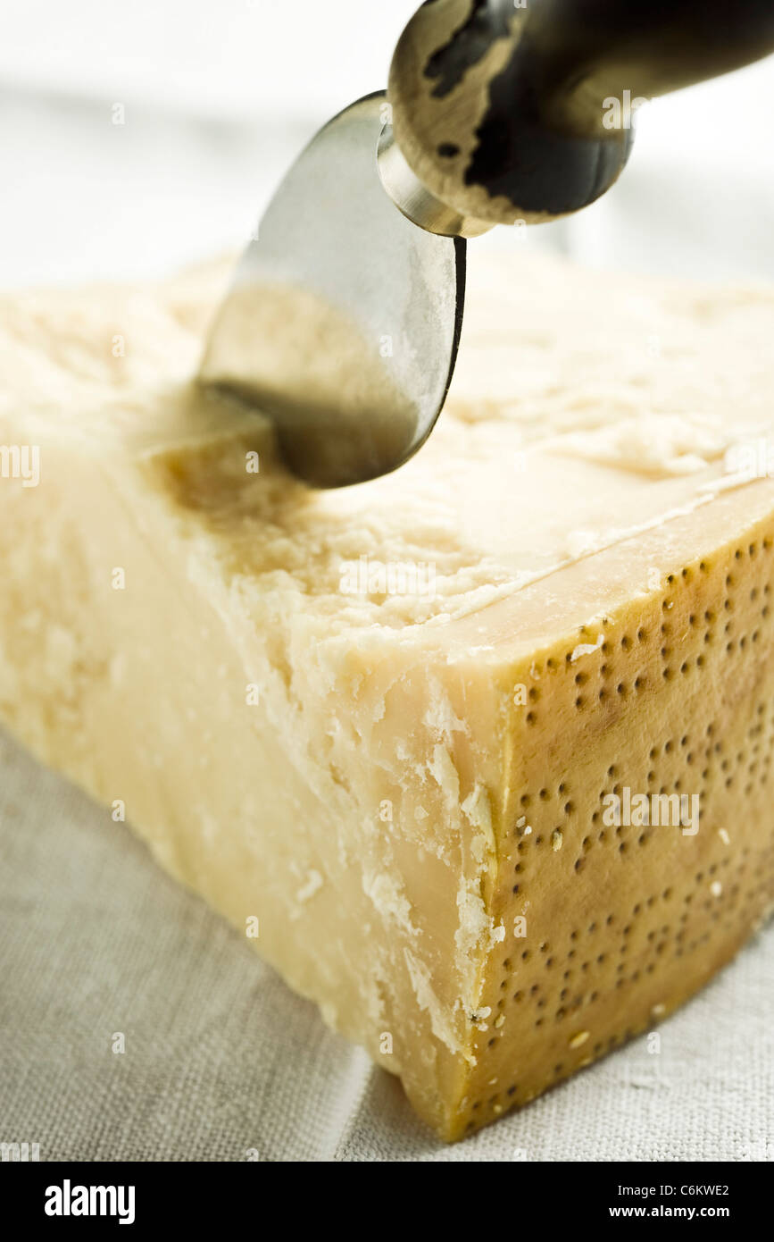 Parmesan cheese and cheese knife Stock Photo - Alamy