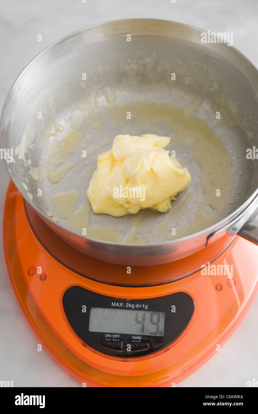 Whipped butter on kitchen scale Stock Photo - Alamy