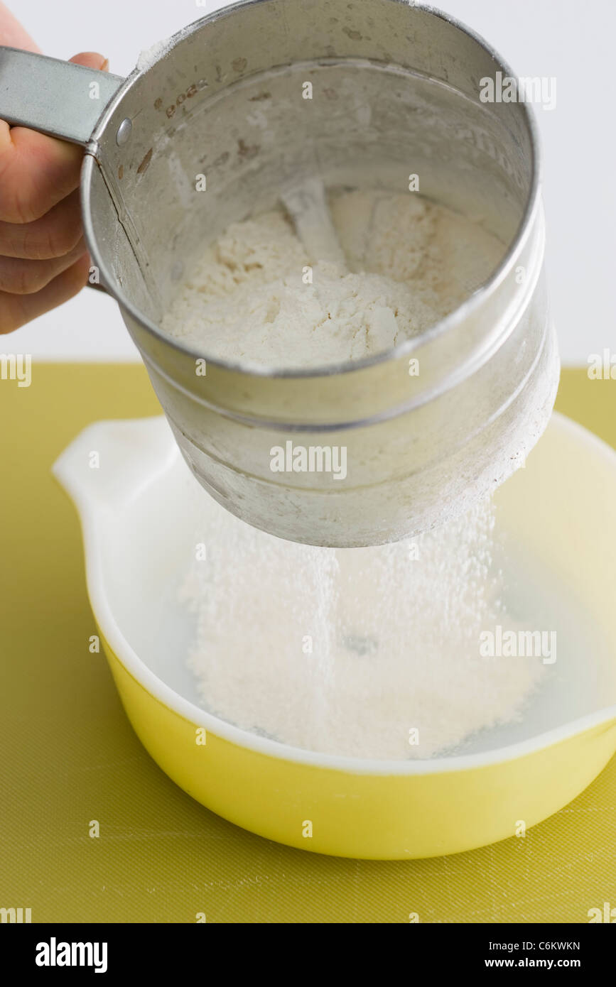 Hand sifting hi-res stock photography and images - Alamy