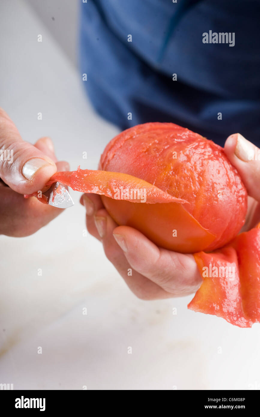Tomato peeling hi-res stock photography and images - Alamy